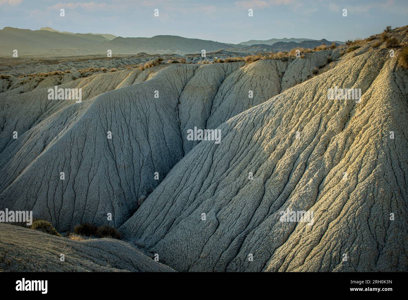Horizontal photograph of the winding arid and desert landscape of ...