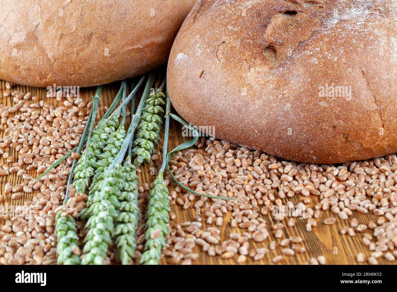 wheat bread on a wooden table, fresh healthy bread made from wheat ...