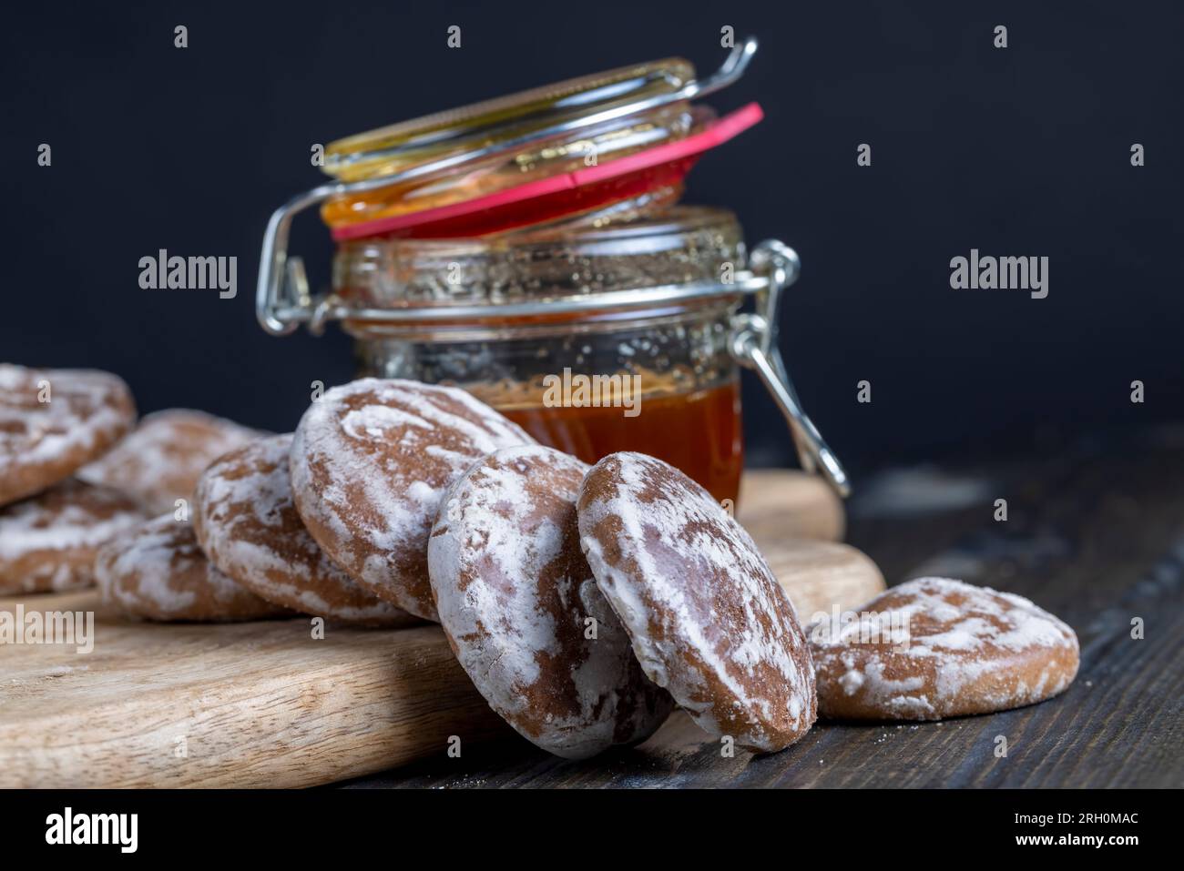 iced sugar gingerbread on a cutting board, flour pastry made of ...
