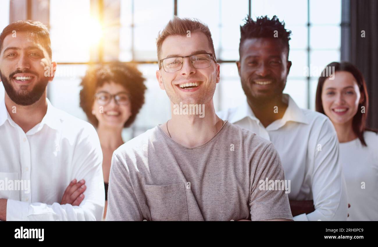 Smiling professional business leaders and employees group team portrait ...