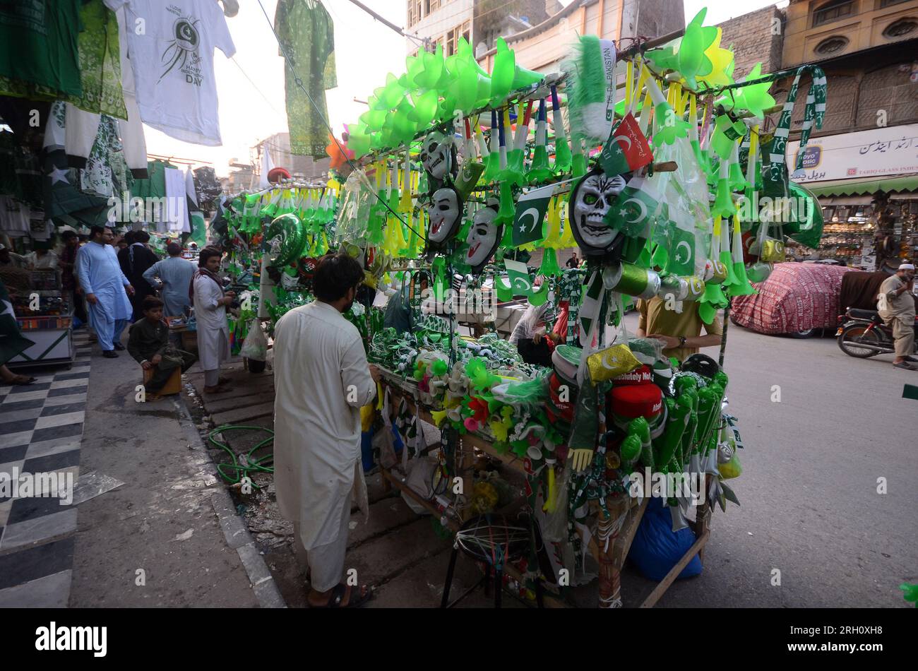 Peshawar, Peshawar, Pakistan. 12th Aug, 2023. People visit a market to ...