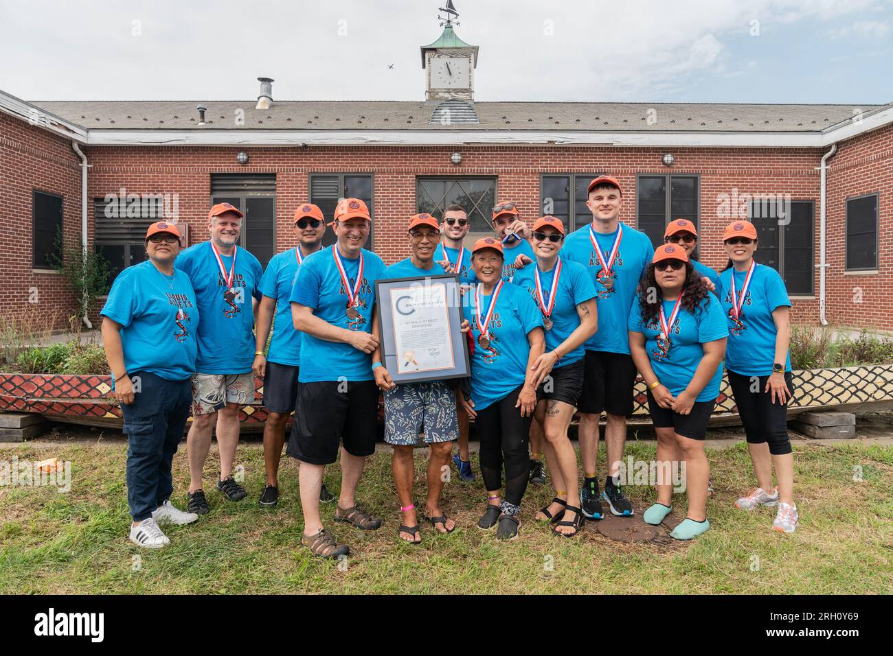 City Comptroller's team poses after winning the race in Hong Kong ...