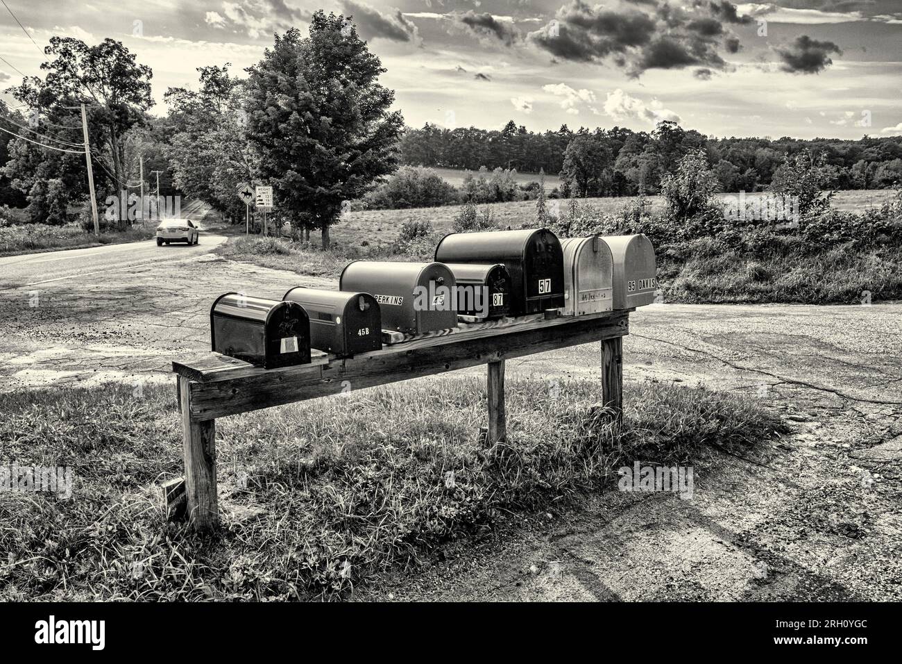 Rural mailboxes lined up on a road in a rural town Stock Photo - Alamy