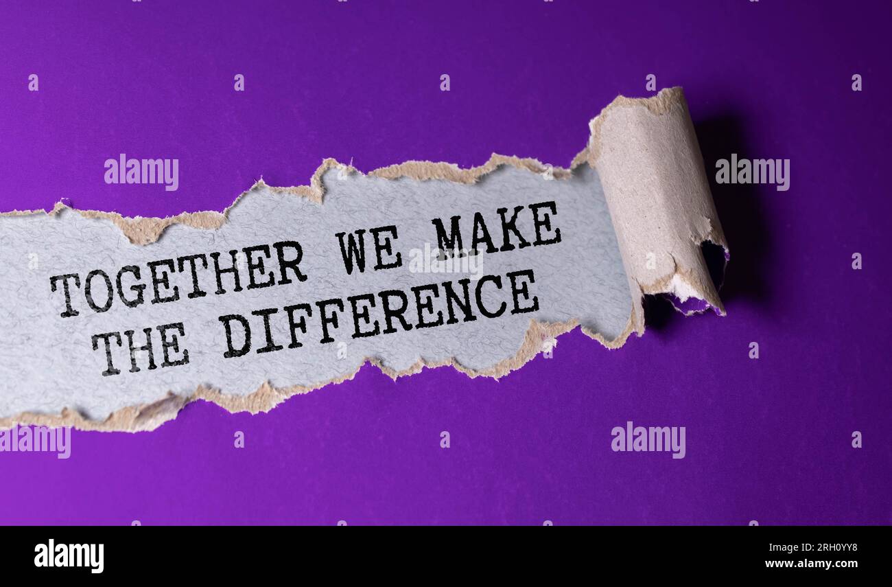 Together We Make A Difference appearing behind torn paper. Business ...