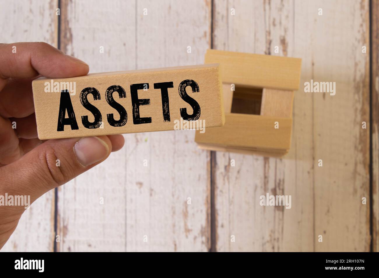 assets word written on wood block, business concept Stock Photo - Alamy