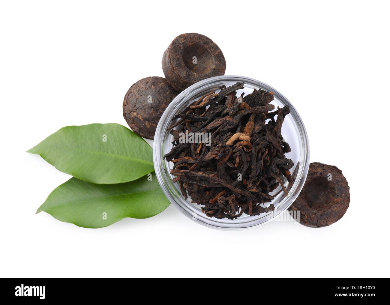 Traditional Chinese pu-erh tea and fresh leaves isolated on white, top ...