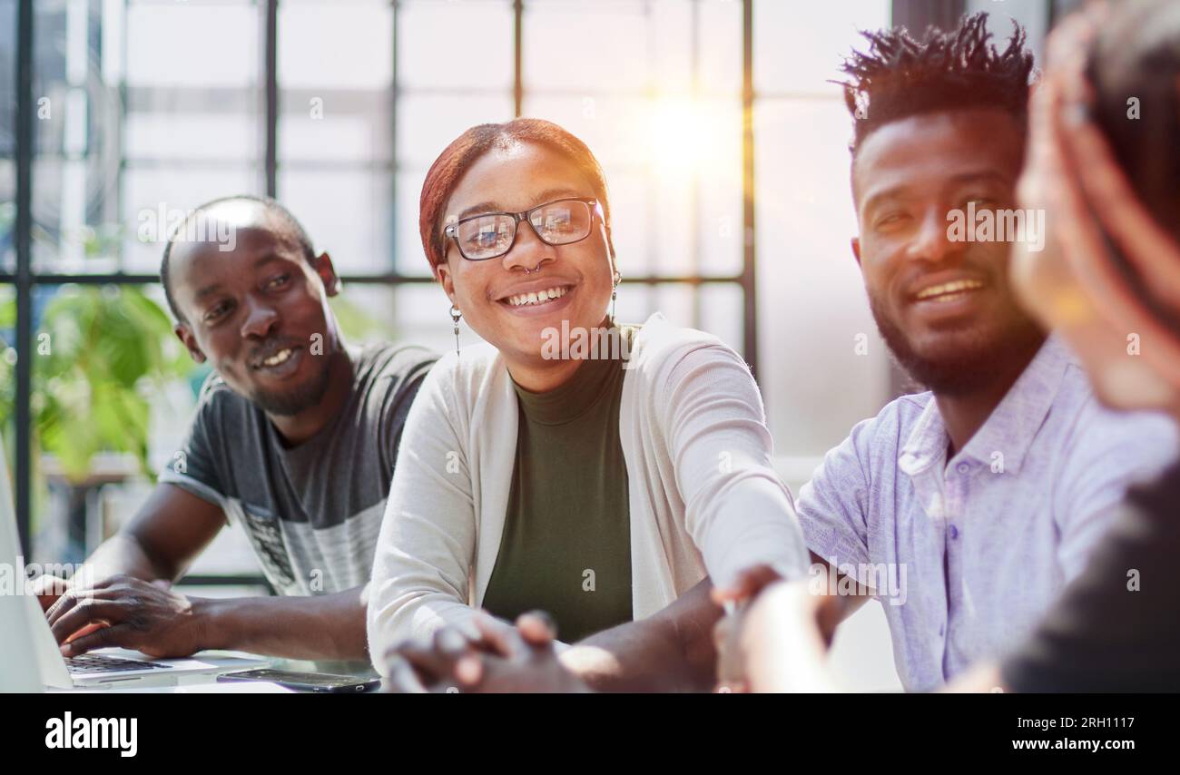 African american hr team welcoming female applicant at job interview ...