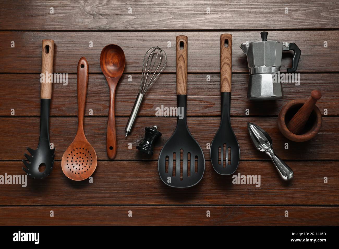 Set of different kitchen utensils on wooden table, flat lay Stock Photo ...