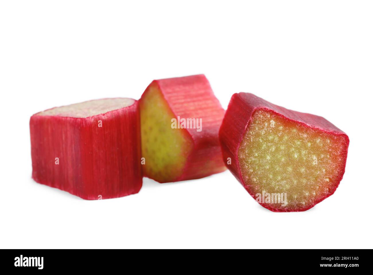 Pieces of ripe rhubarb isolated on white Stock Photo - Alamy