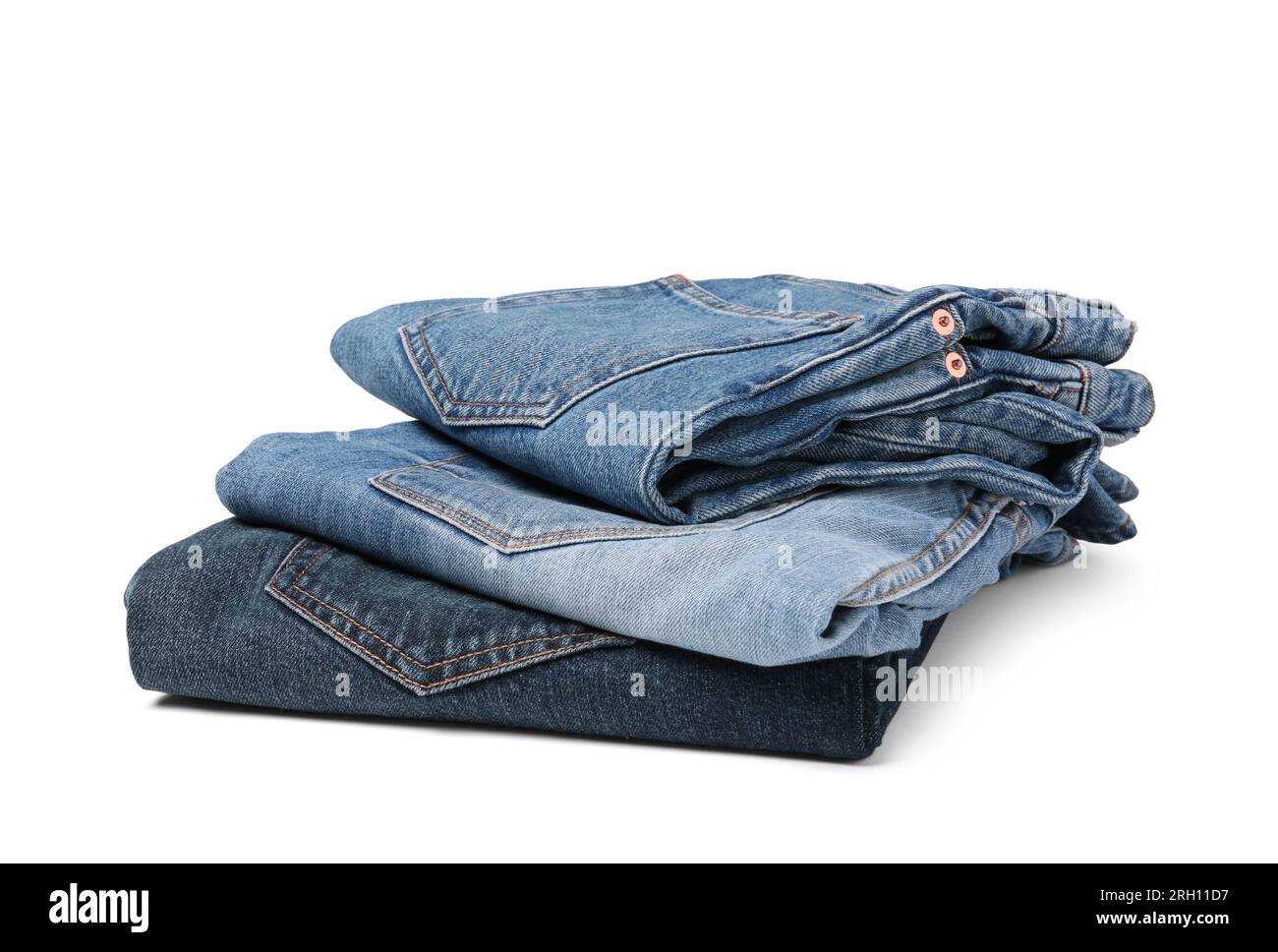 Stack of different folded jeans isolated on white Stock Photo - Alamy