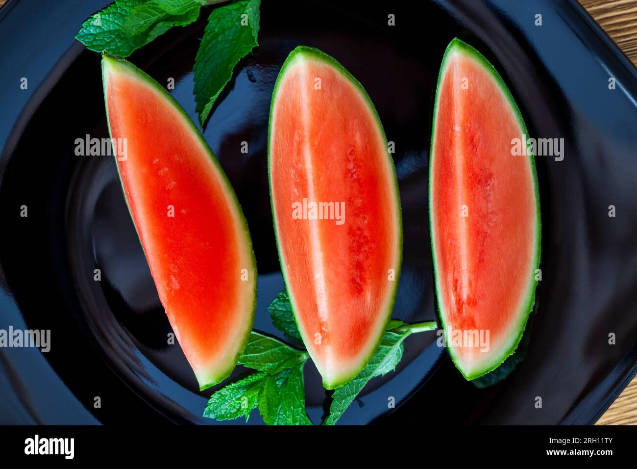 sliced ripe red watermelon without seeds, the watermelon is ripe and ...