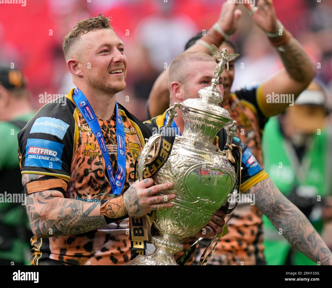 Josh Charnley #5 of Leigh Leopards lifts the BetFred Challenge Cup ...