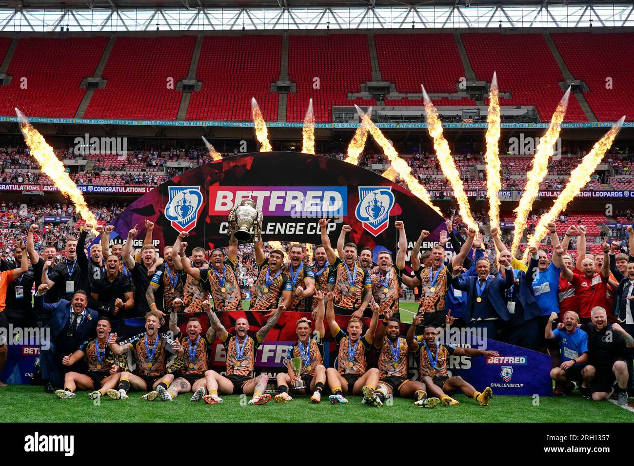 London, UK. 12th Aug, 2023. Leigh Leopards squad celebrate their victory after a 17-16 Golden ...