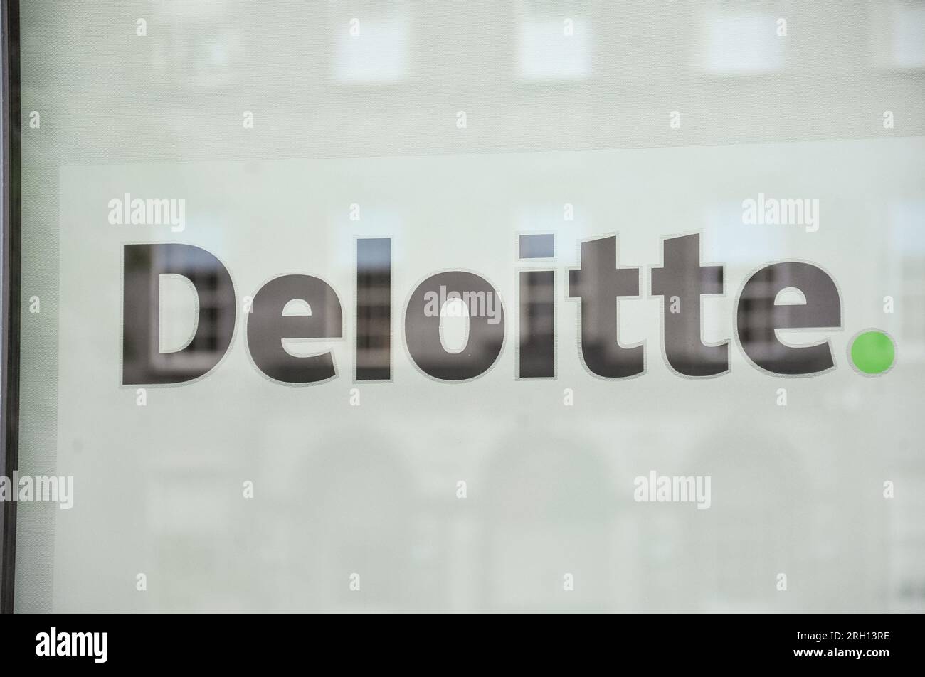 Deloitte company signage Stock Photo - Alamy