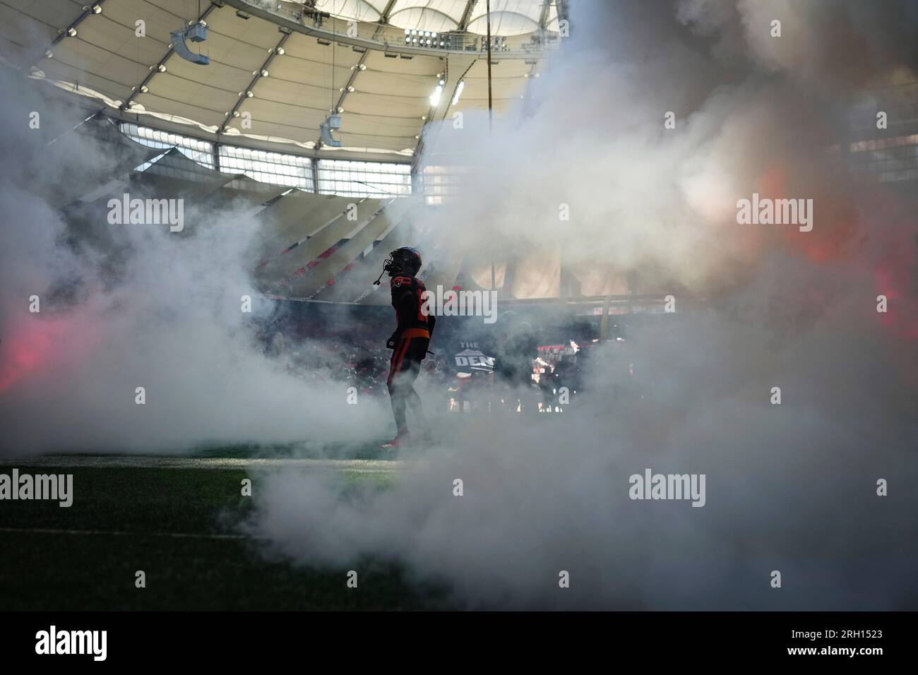 B.C. Lions' Alexander Hollins stands on the field before the team's ...