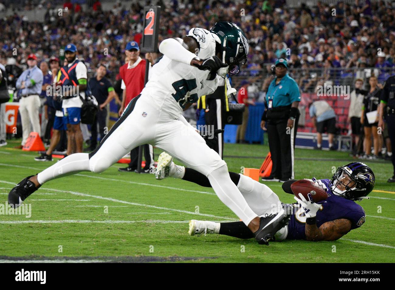 Baltimore Ravens wide receiver Tylan Wallace, right, catches a ...