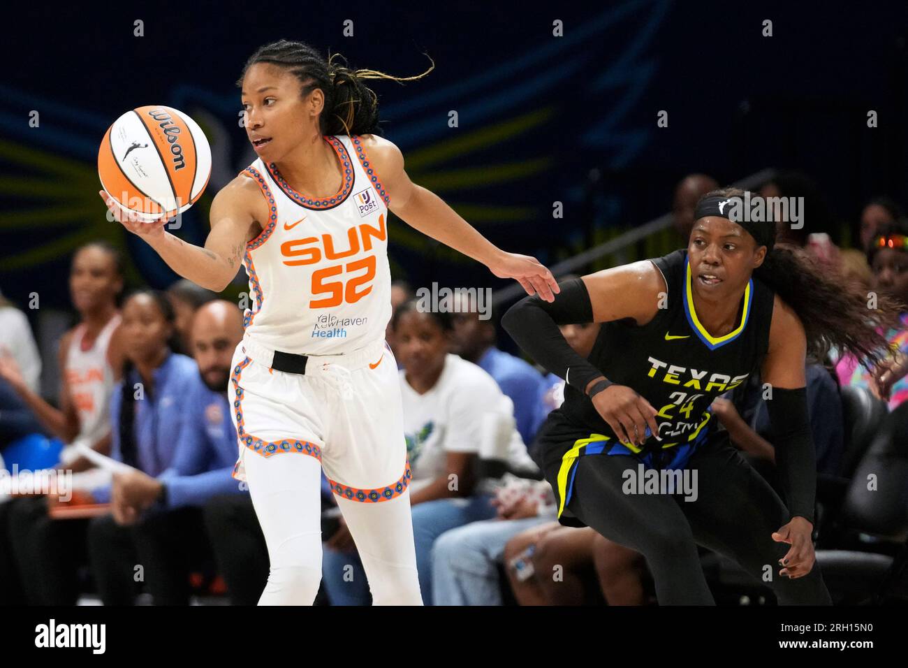 Connecticut Sun guard Tyasha Harris (52) gets control of the ball in ...