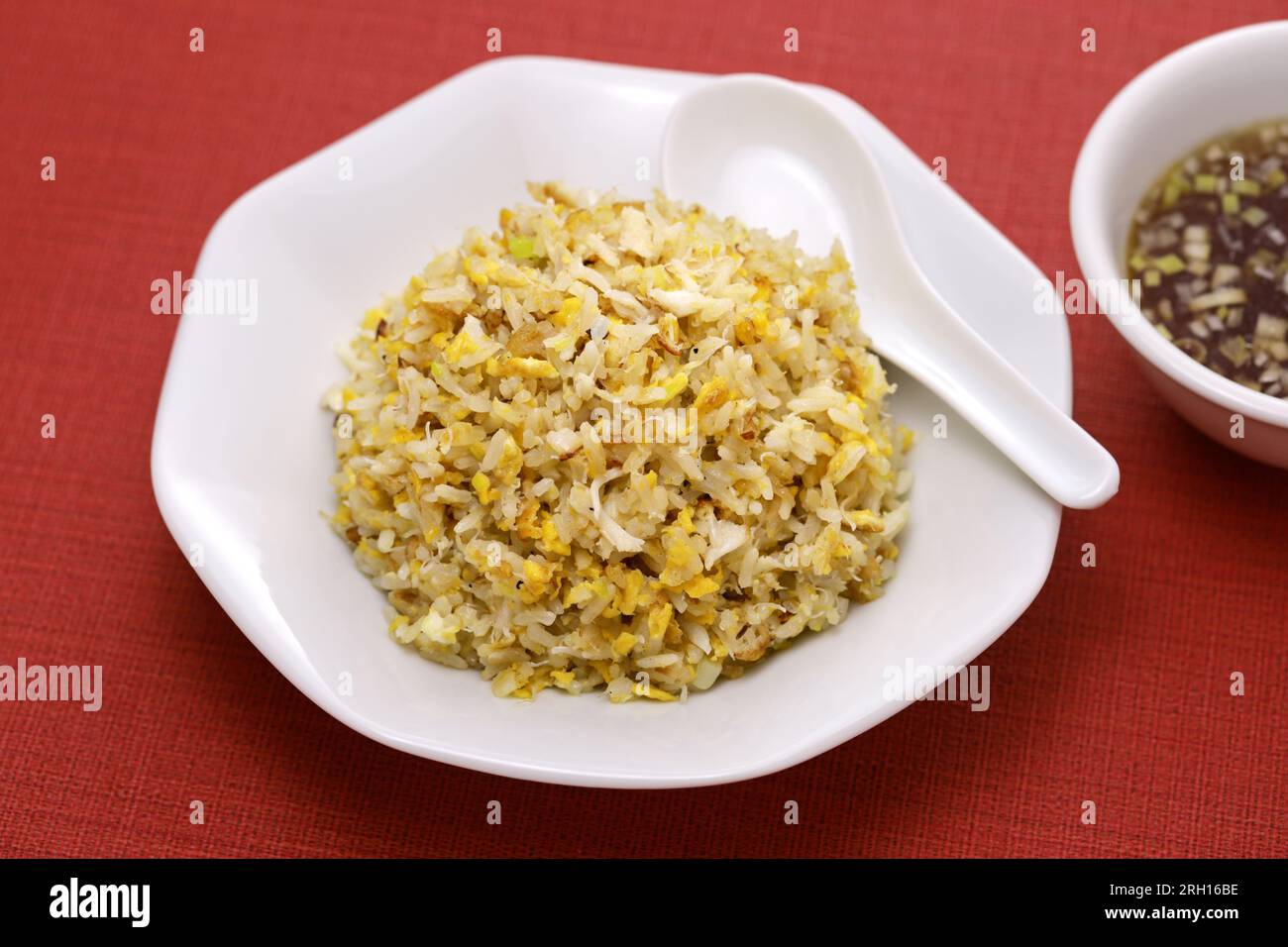 crab meat fried rice, Chinese cuisine isolated on red background Stock ...