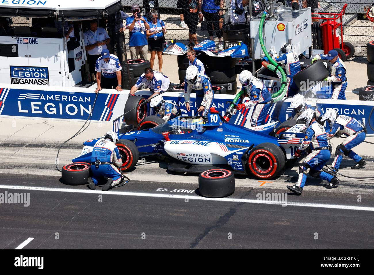 INDIANAPOLIS, IN - AUGUST 12: IndyCar driver Alex Palou (10) pulls in for a pit stop during the ...