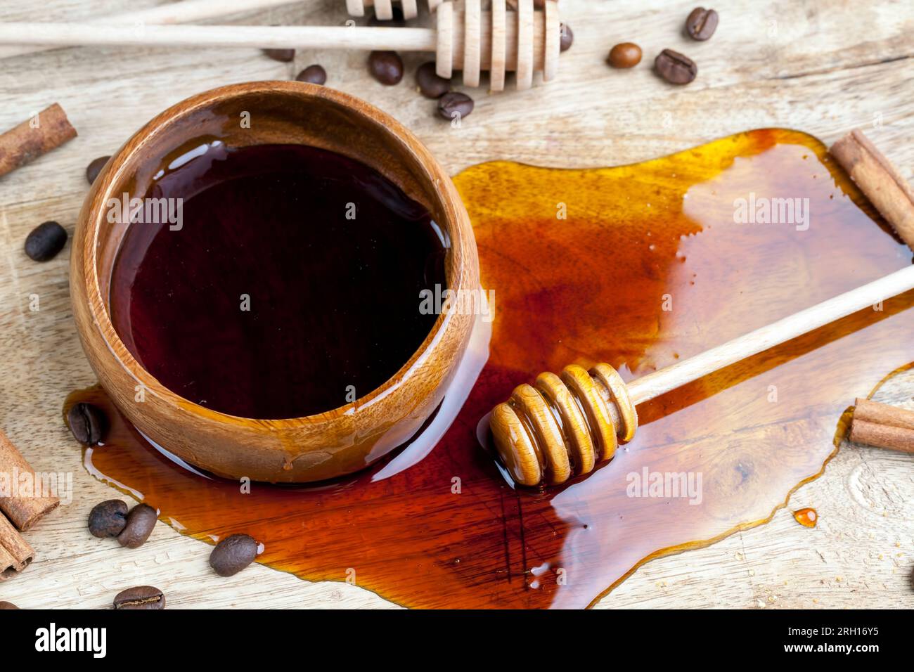 natural sweet honey spreads on the board during cooking, real honey bee ...