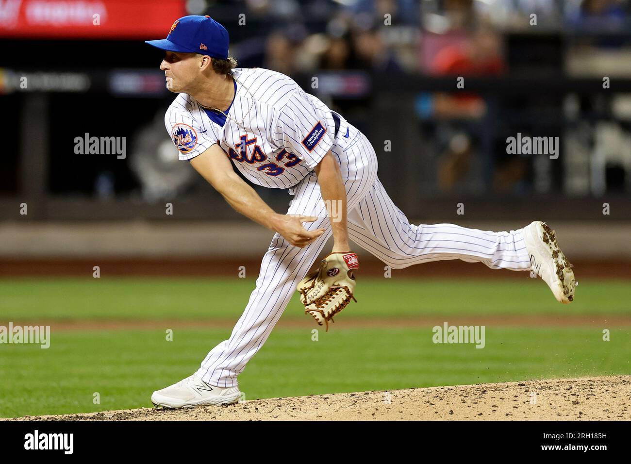New York Mets pitcher Trevor Gott throws against the Atlanta Braves ...