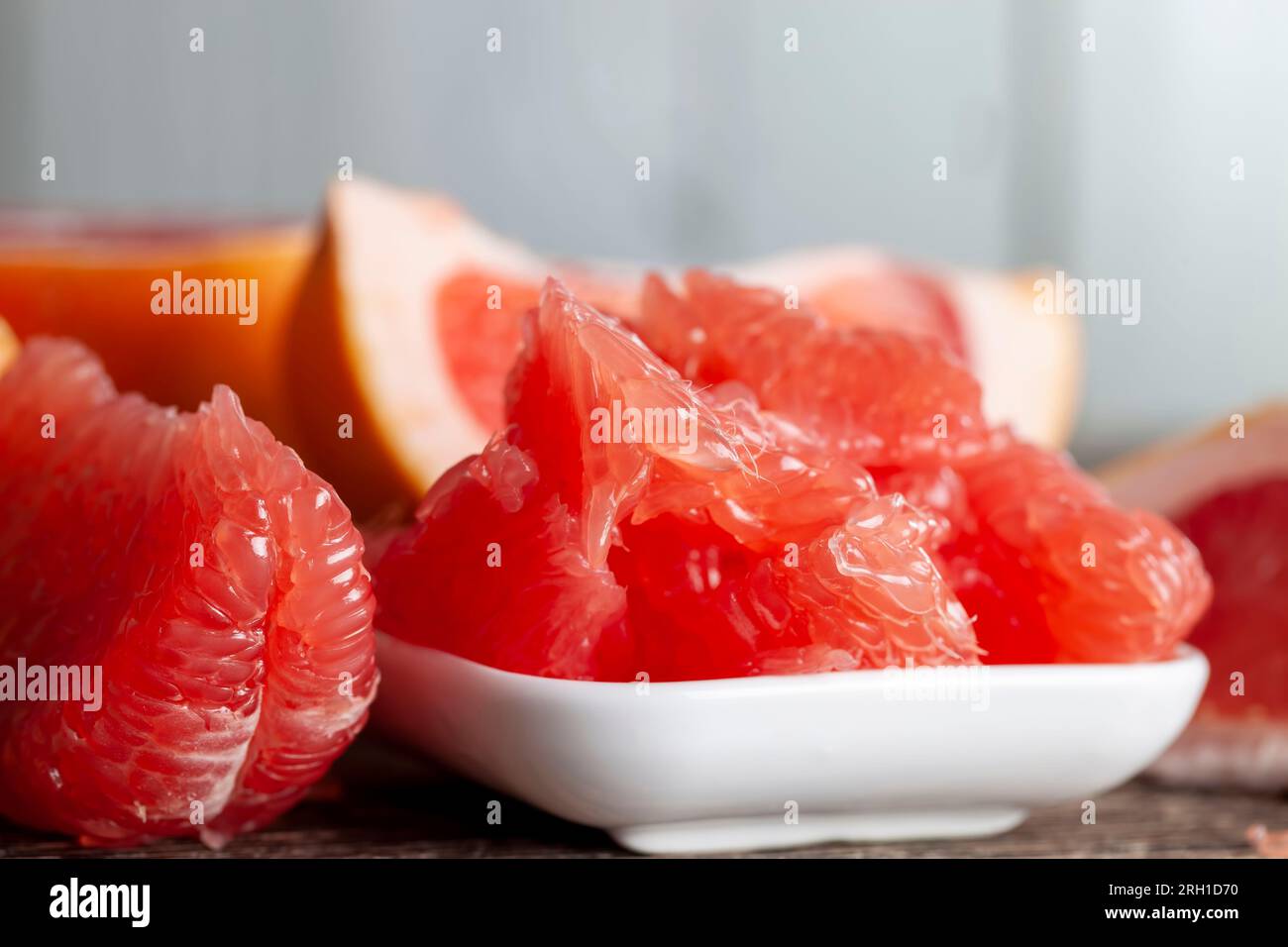 peeled and divided into parts ripe red grapefruit, grapefruit with ...