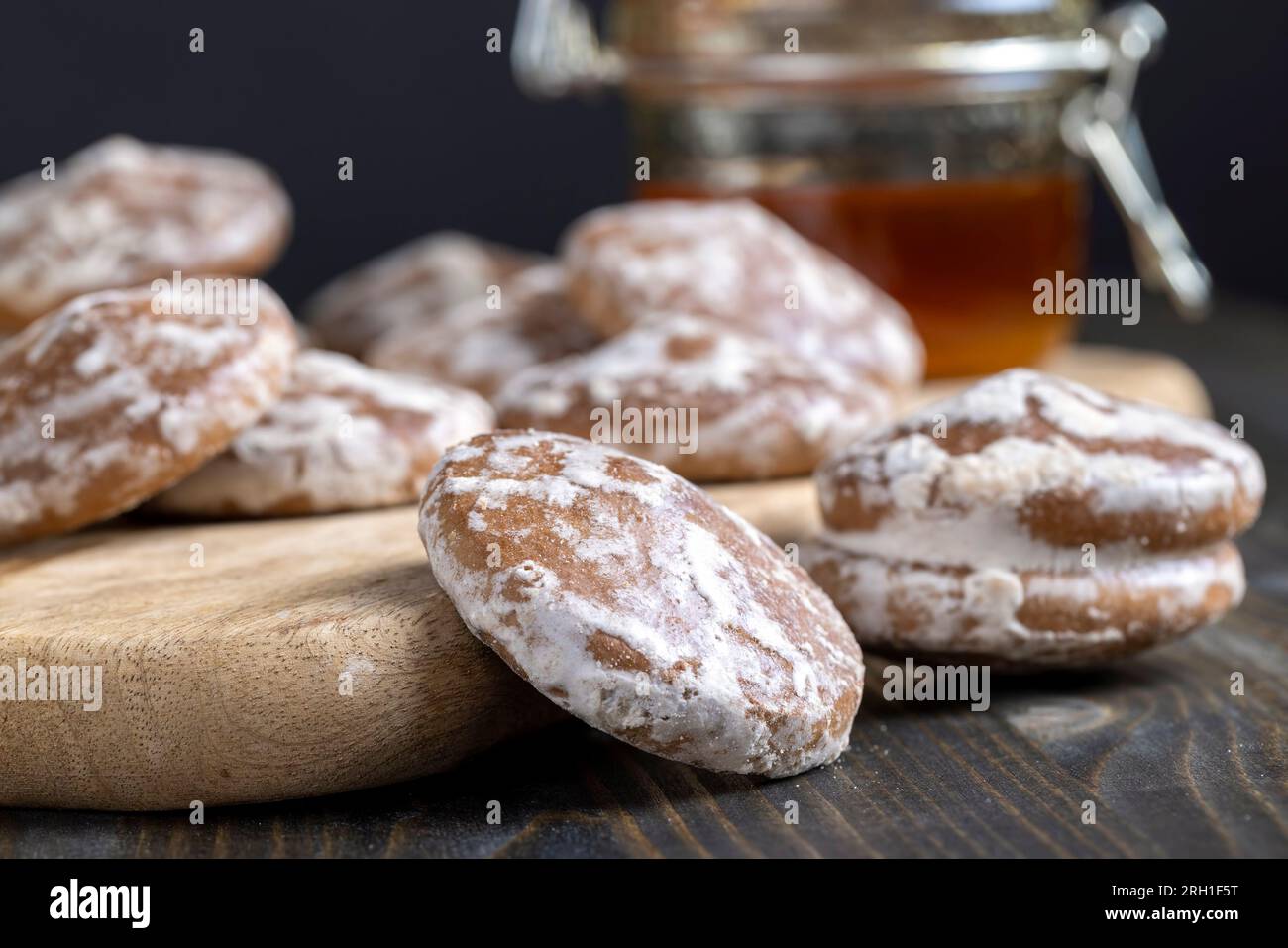 iced sugar gingerbread on a cutting board, flour pastry made of ...