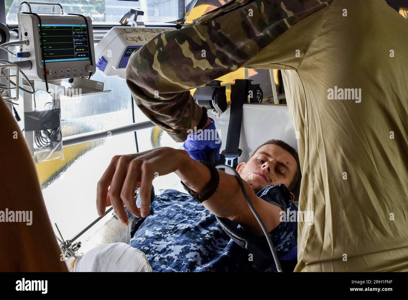 Volunteer of Hospitallers paramedic organisation treats wounded ...