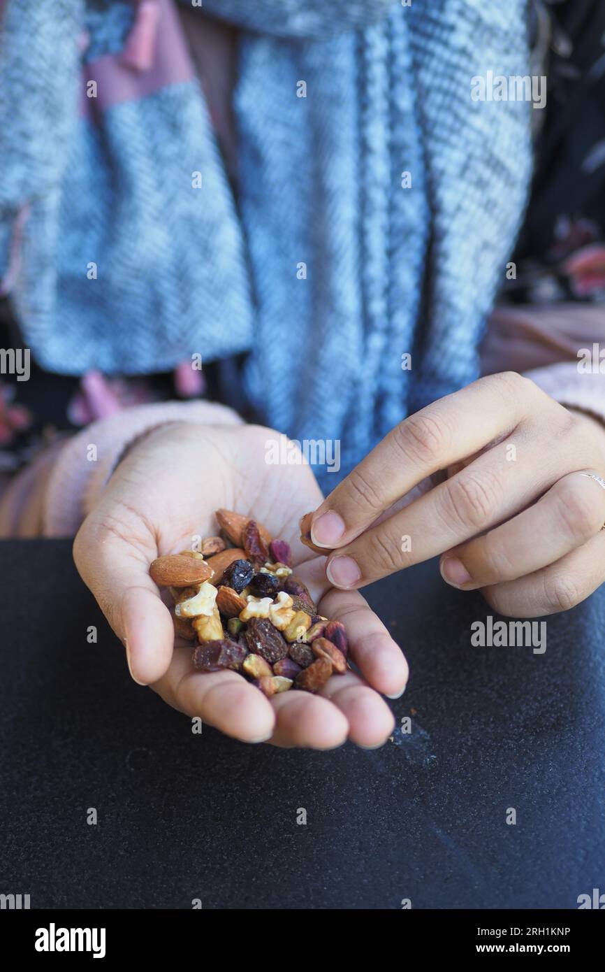 Women hand pick many mixed hi-res stock photography and images - Alamy