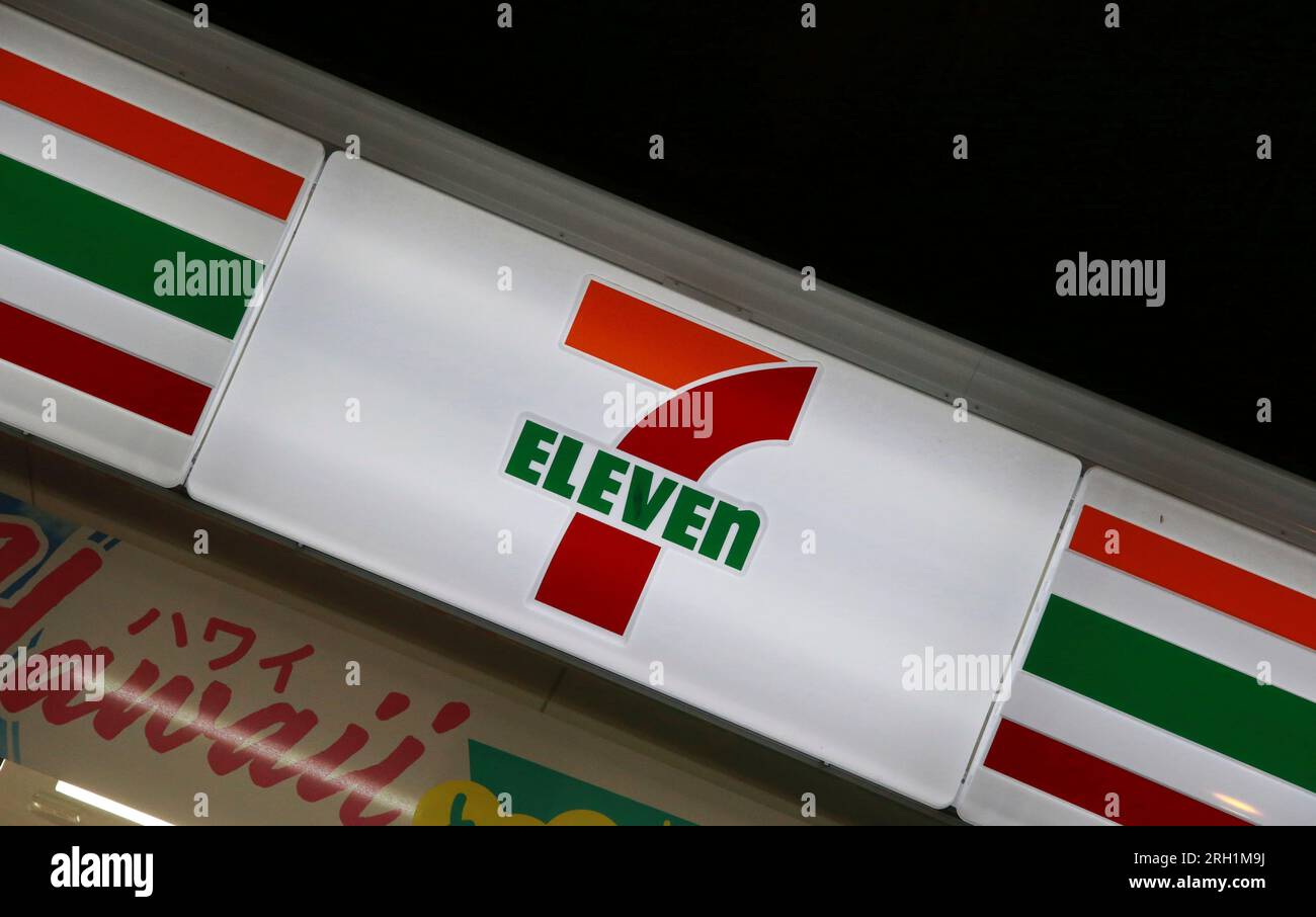 The logo of 7-Eleven is seen in Shinjuku Ward, Tokyo on June 15, 2022 ...