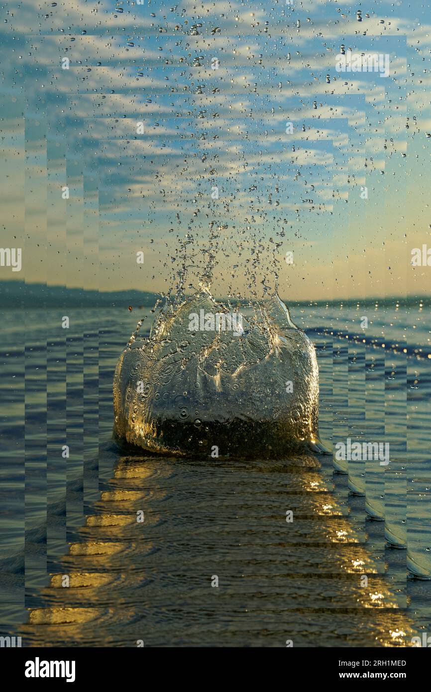 Water fountain at sunset Stock Photo - Alamy