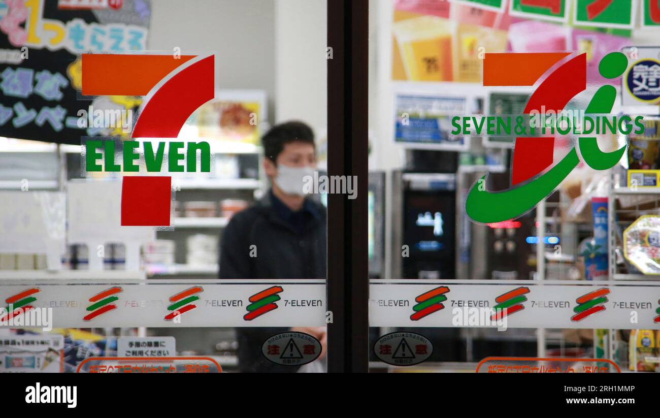 The logo of 7-Eleven is seen in Shinjuku Ward, Tokyo on June 15, 2022 ...