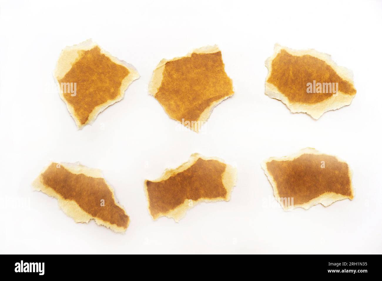 pieces of brown teared cardboard isolated Stock Photo - Alamy