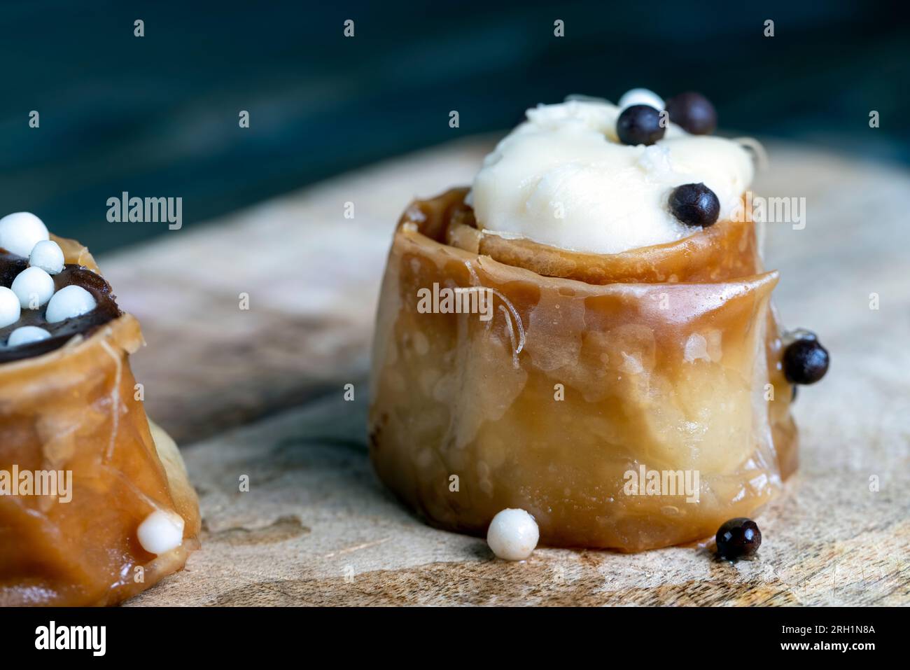sweets made of thin puff pastry with chocolate filling and honey ...