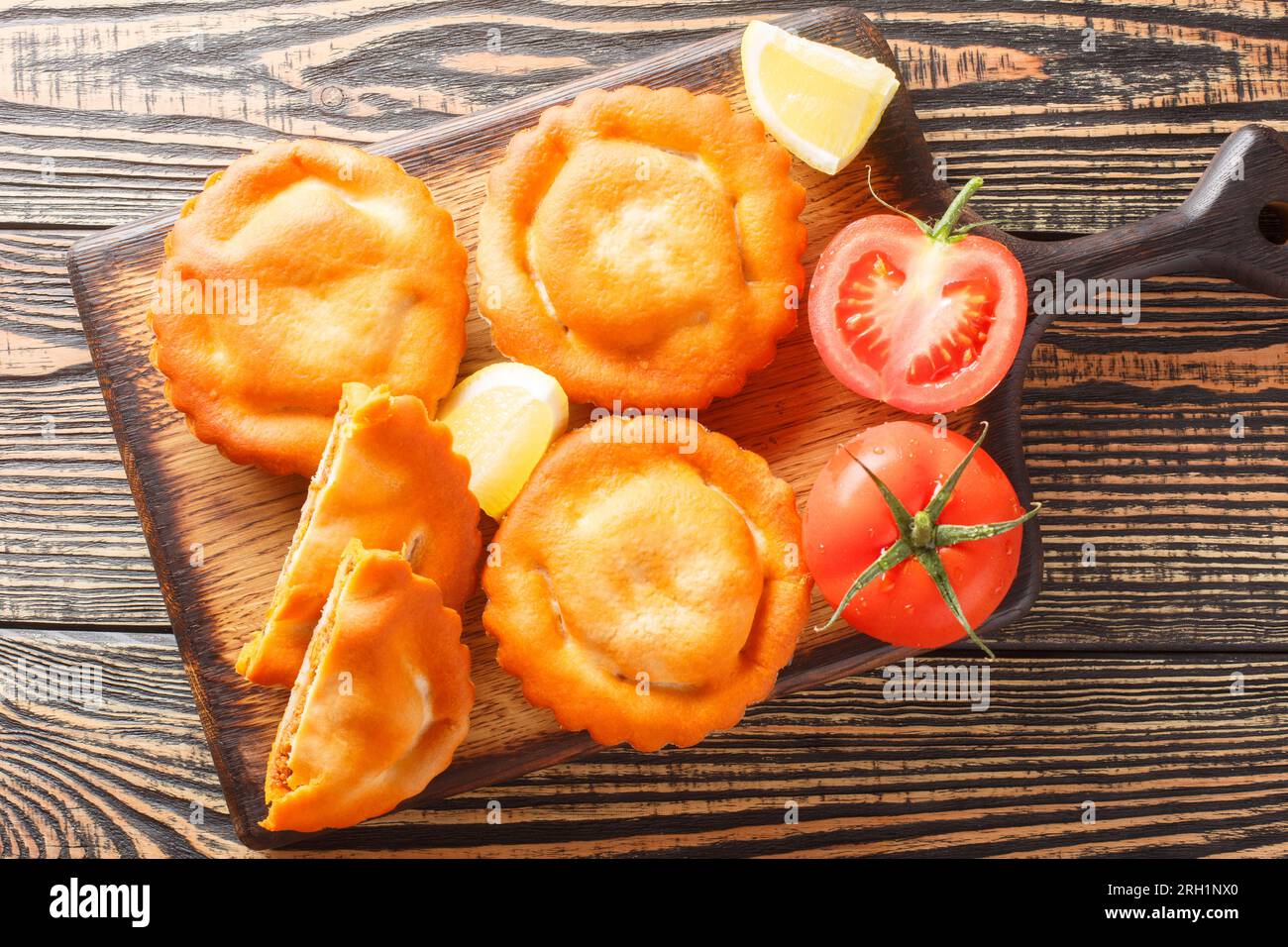Tielle Setoise small spicy pie of octopus in tomatoes closeup on a ...