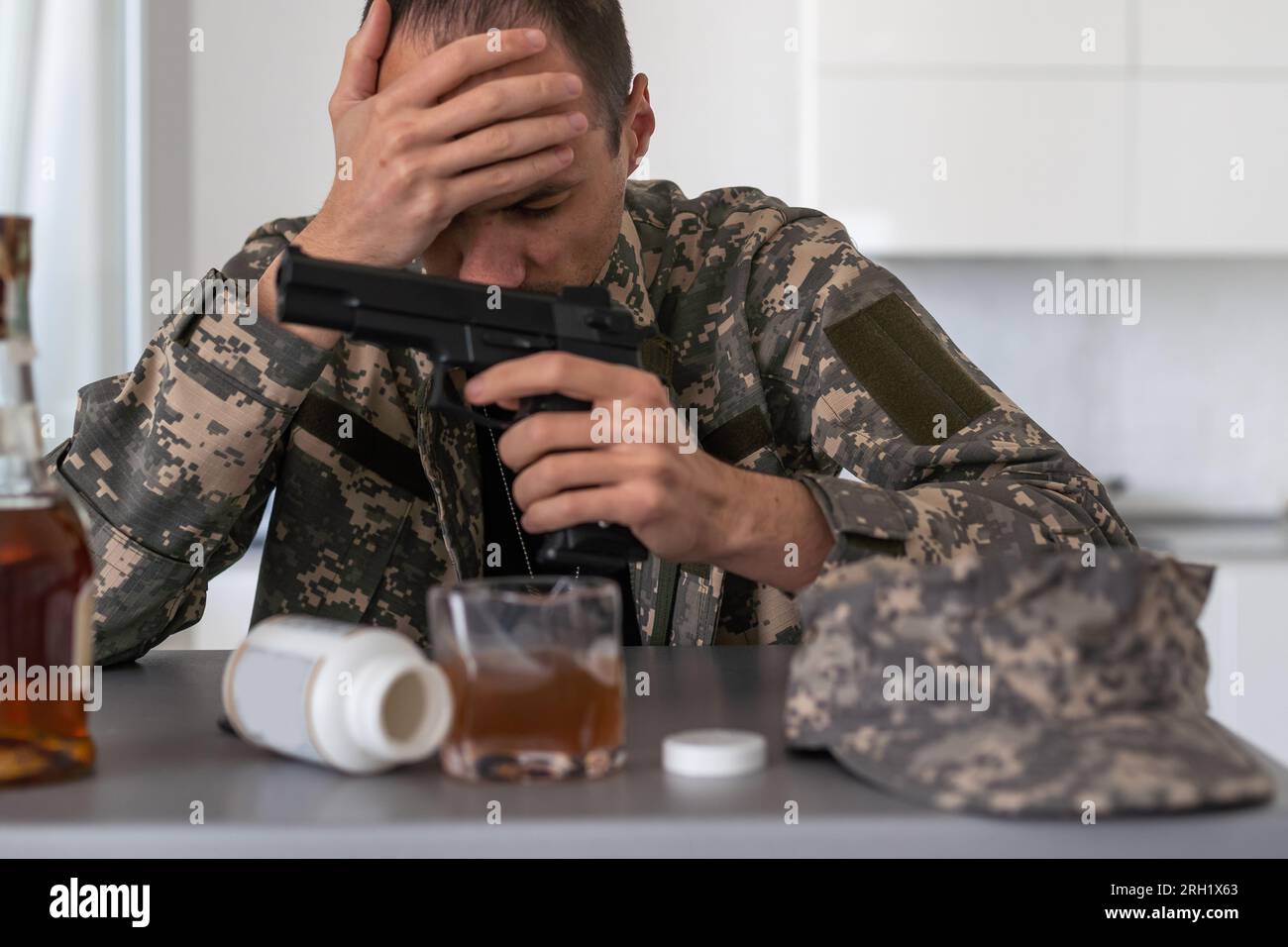 Serious anxious and nervous military man suffers from depression while ...