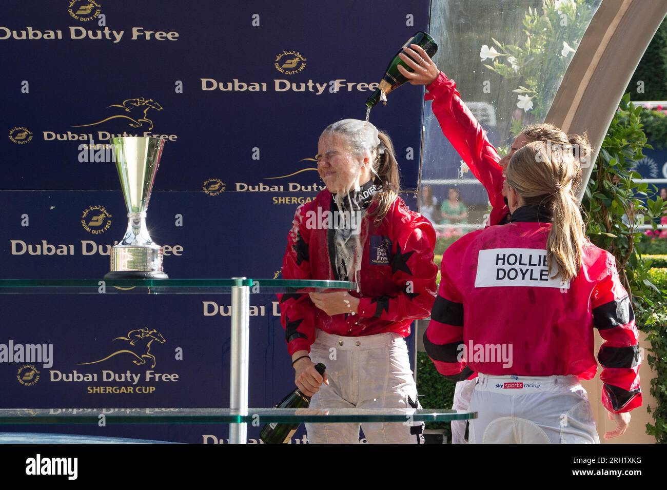 Ascot, Berkshire, UK. 12th August, 2023. Celebrating with spraying each ...