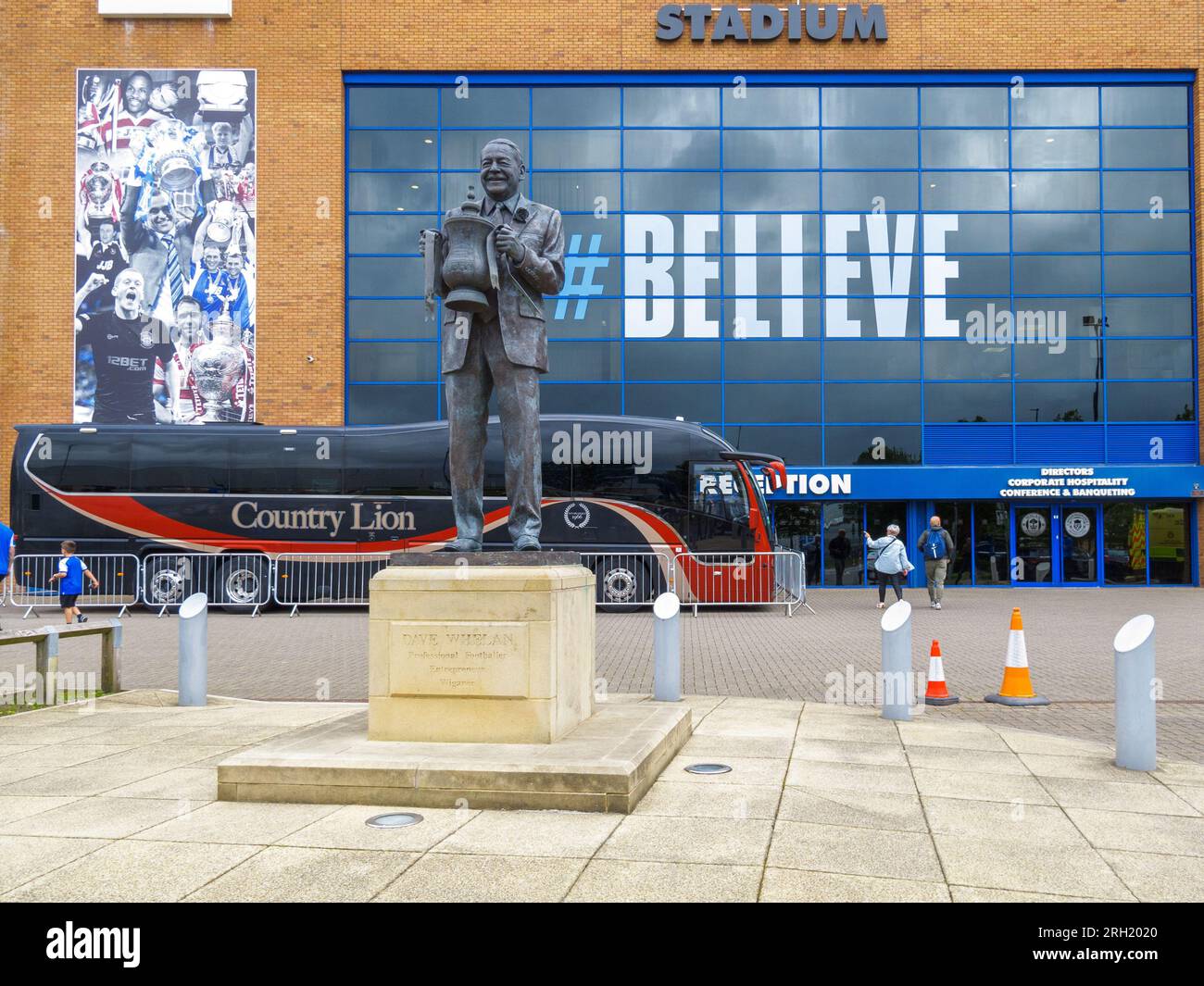 The Dave Whelan statue at the DM Stadium, Wigan Stock Photo - Alamy