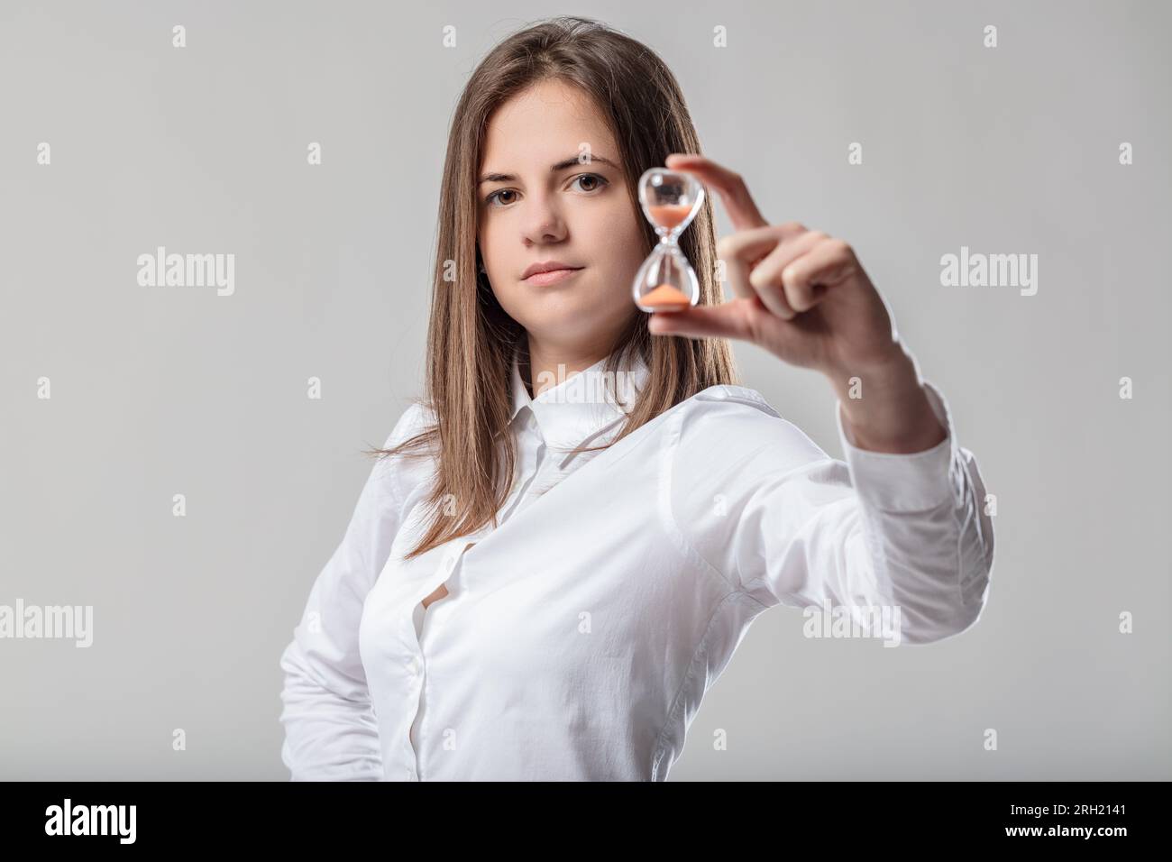 Time passes, procrastination loses, latecomers miss out. A woman in ...