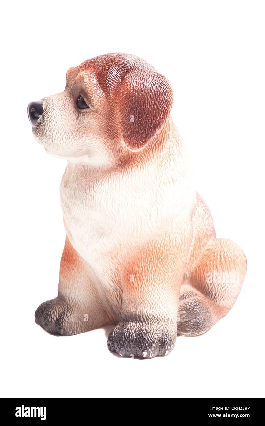 Rubber toy dog figurine isolated on white background Stock Photo - Alamy