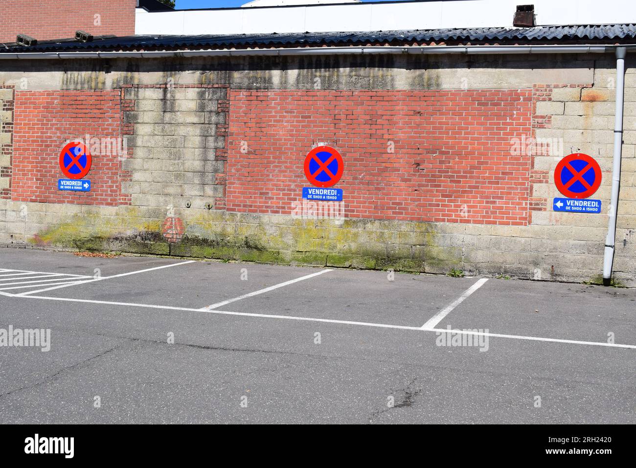 no parking sign for Fridays on a parking lot Stock Photo - Alamy