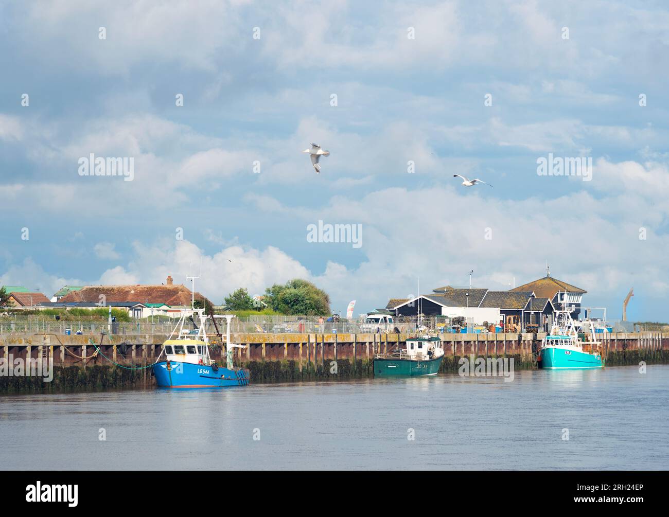 The tidal River Blyth showing fishing boats moored on the Southwold ...