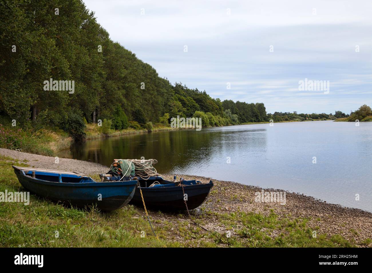 River Tweed, Berwickshire, Scotland with boats on the river bank Stock ...