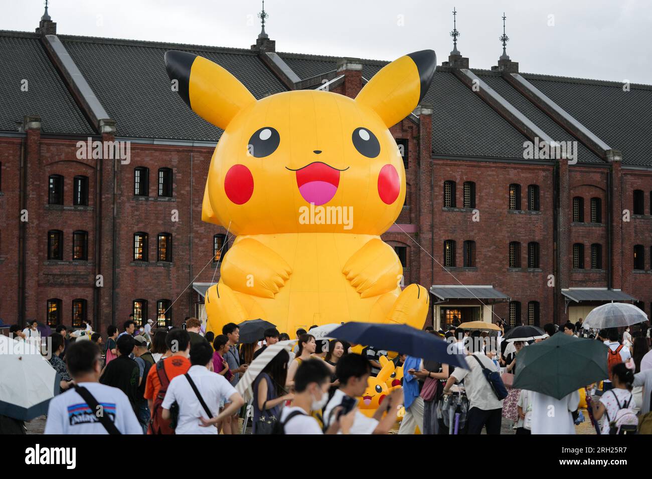 Yokohama, Japan. 13th Aug, 2023. An inflatable Pikachu is seen at Minatomirai in Yokohama, Japan ...