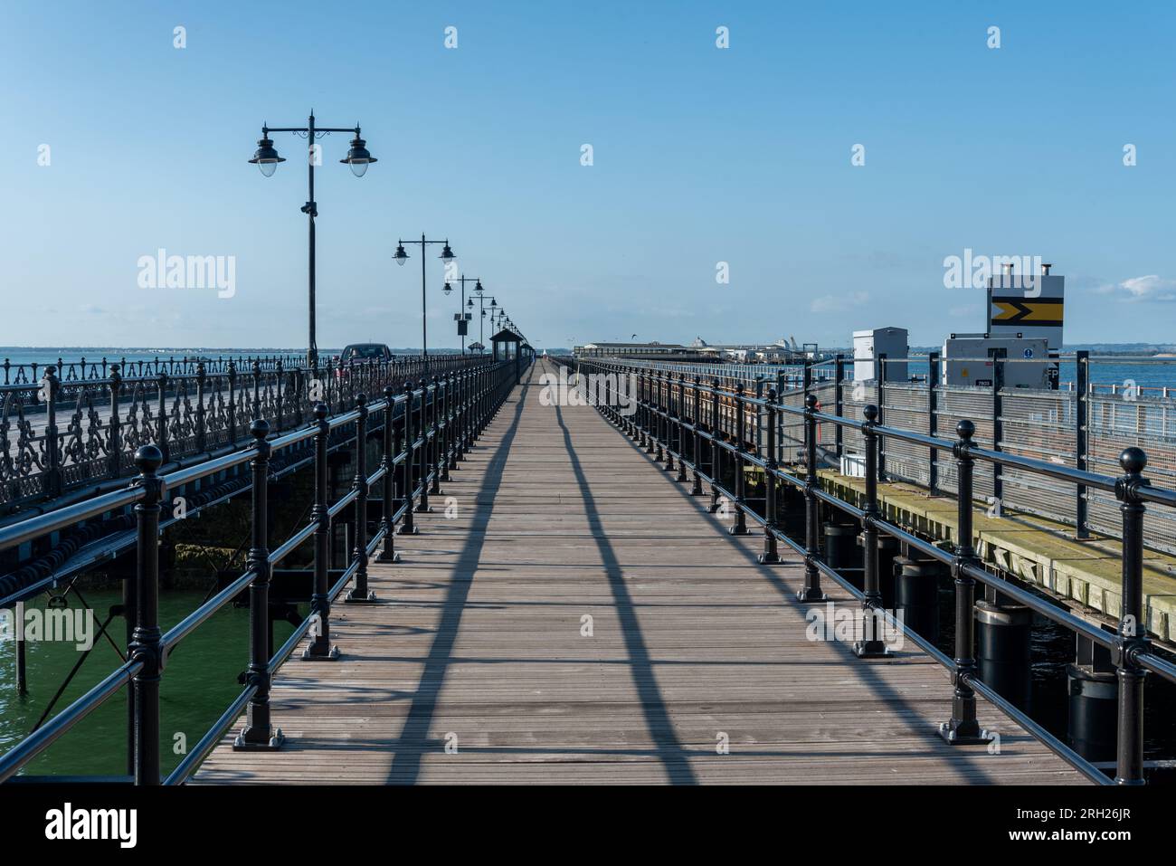 Pedestrian walkway along Ryde pier on the Isle of Wight, looking ...