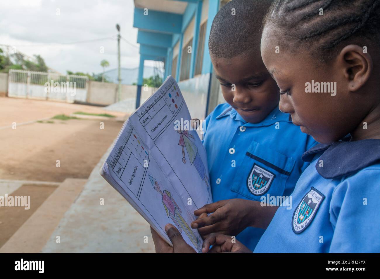 African Kids reading at school in a book - Ghana Stock Photo - Alamy