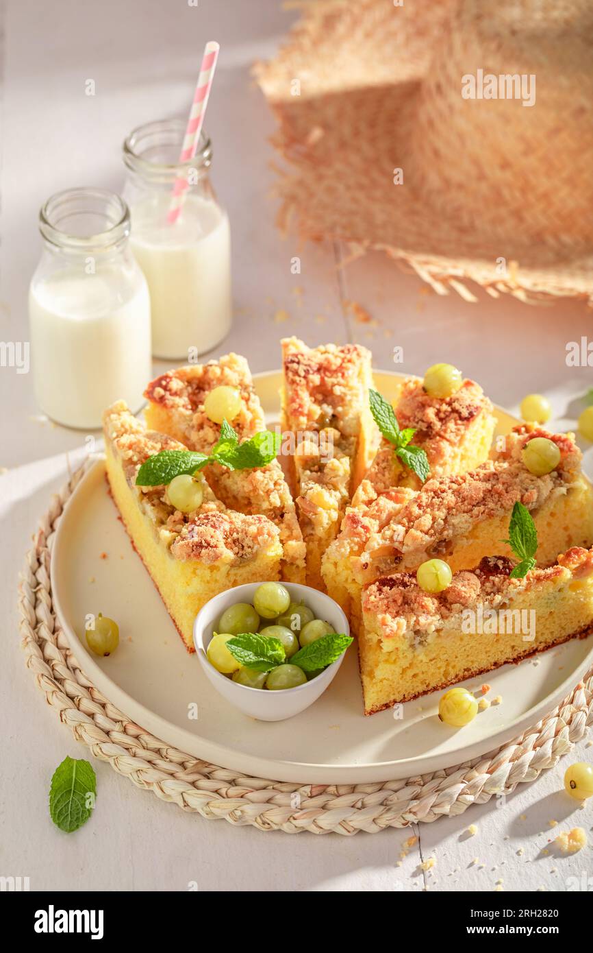 Sweet gooseberry butter cake served with milk in bottle. Gooseberry ...