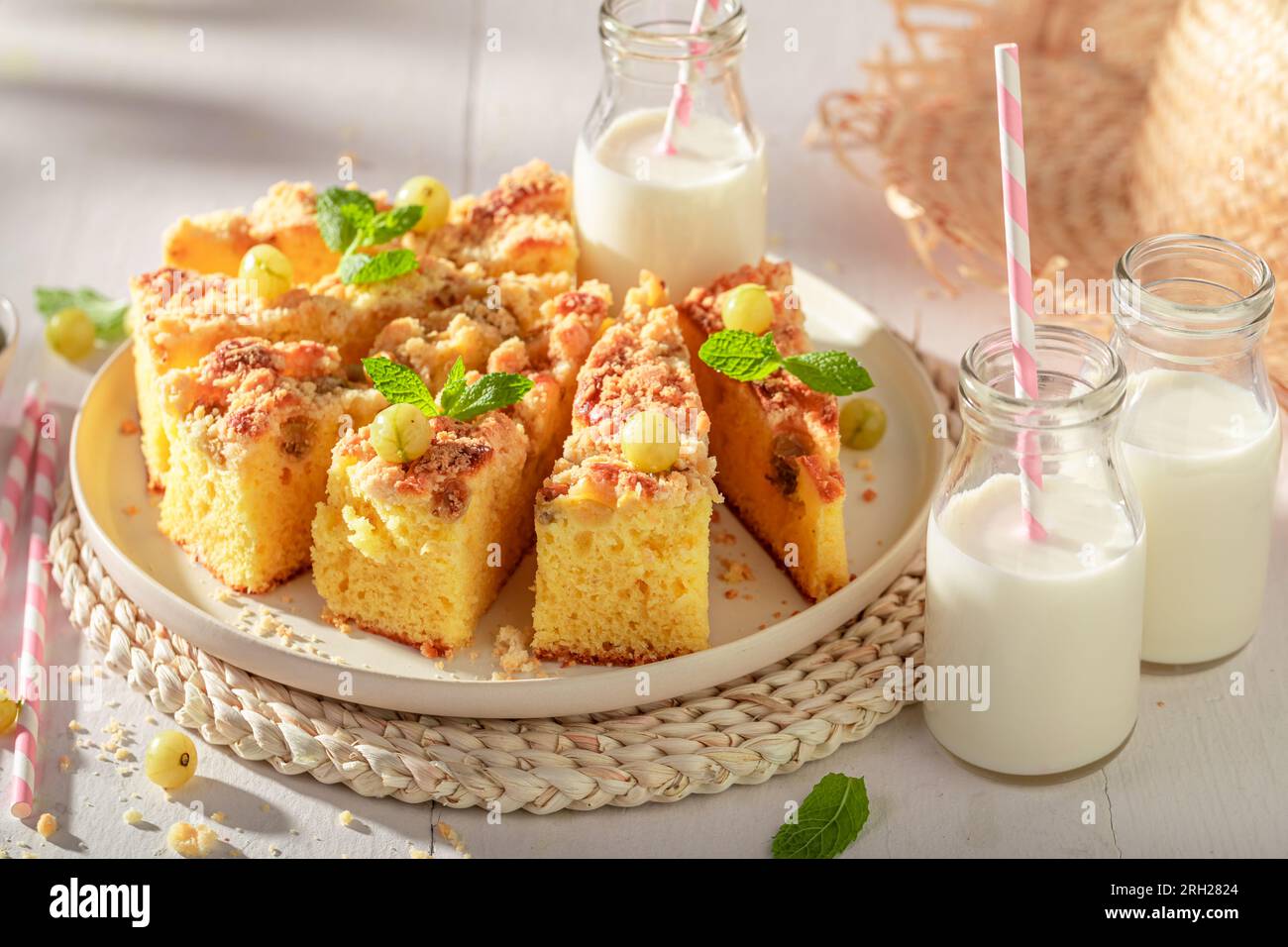 Homemade gooseberry butter cake served with milk in bottle. Gooseberry ...