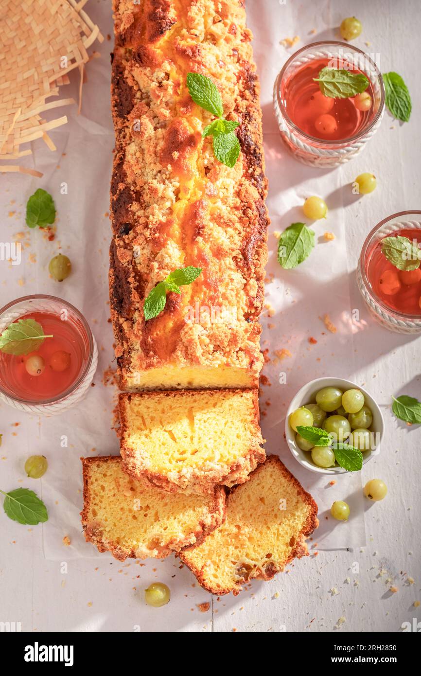 Homemade gooseberry yeast cake with glaze and crumble. Gooseberry yeast ...