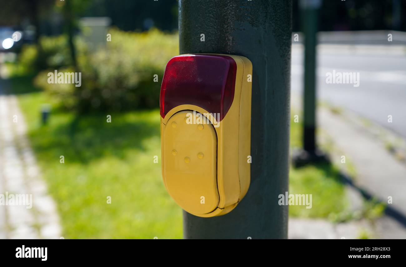 Automatic button on a pedestrian crossing. Push button for accessible ...